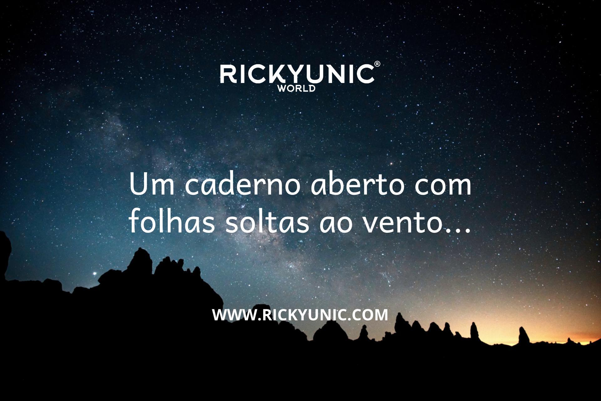 Rickyunic World - Um caderno aberto com folhas soltas ao vento…